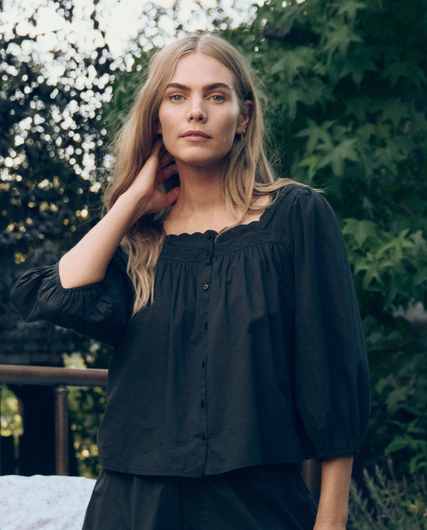 The Eyelet Button Sleep Top. -- Black – The Great.